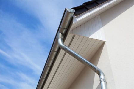 How To Size Gutters and Downspouts - This Old House